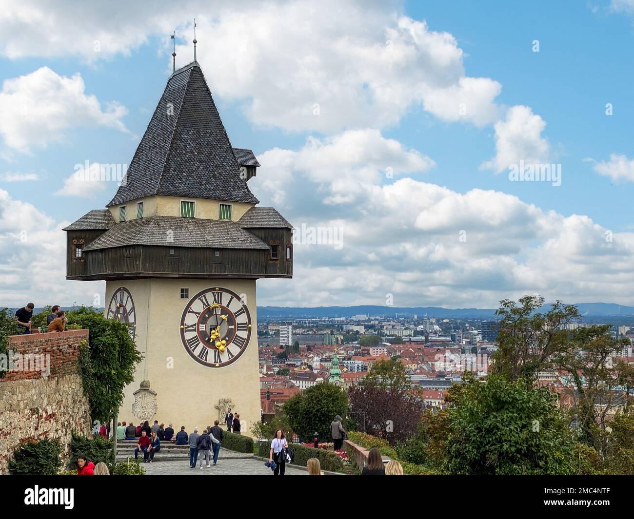 Iconic historic clock tower in the city center of Graz, Austria Stock ...