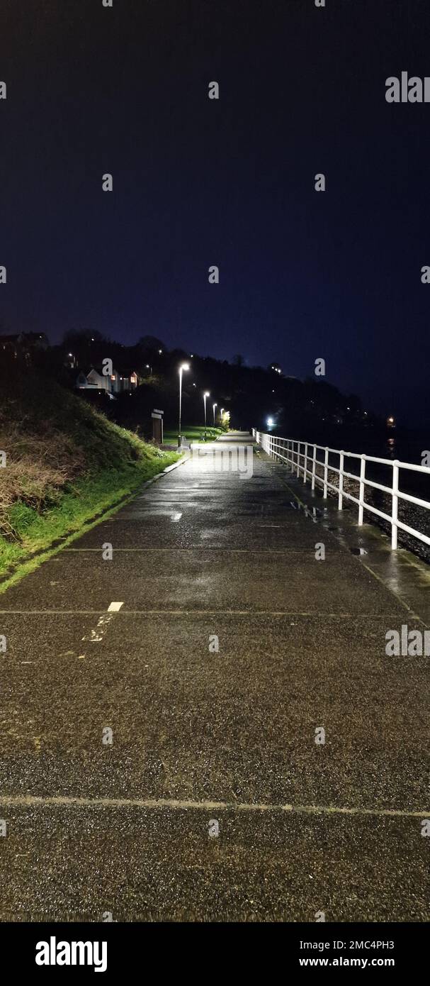 An illuminated pathway at night Stock Photo - Alamy