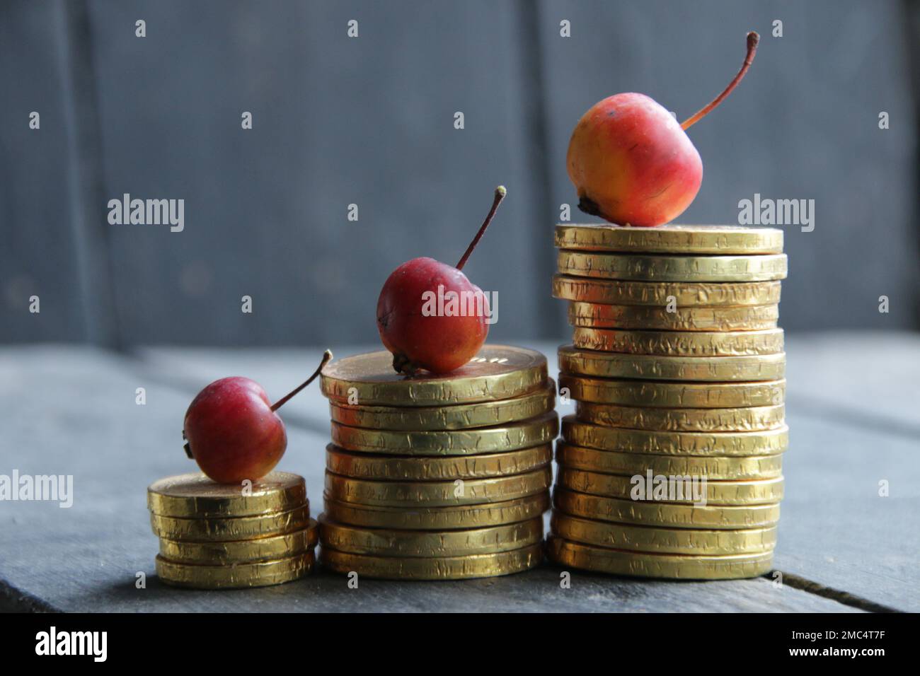 Golden coins raising chart. Diagram with golden coins money Stock Photo ...