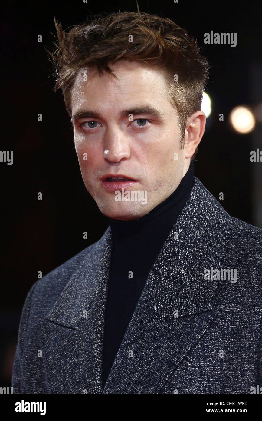 Robert Pattinson poses for photographers upon arrival for the screening ...