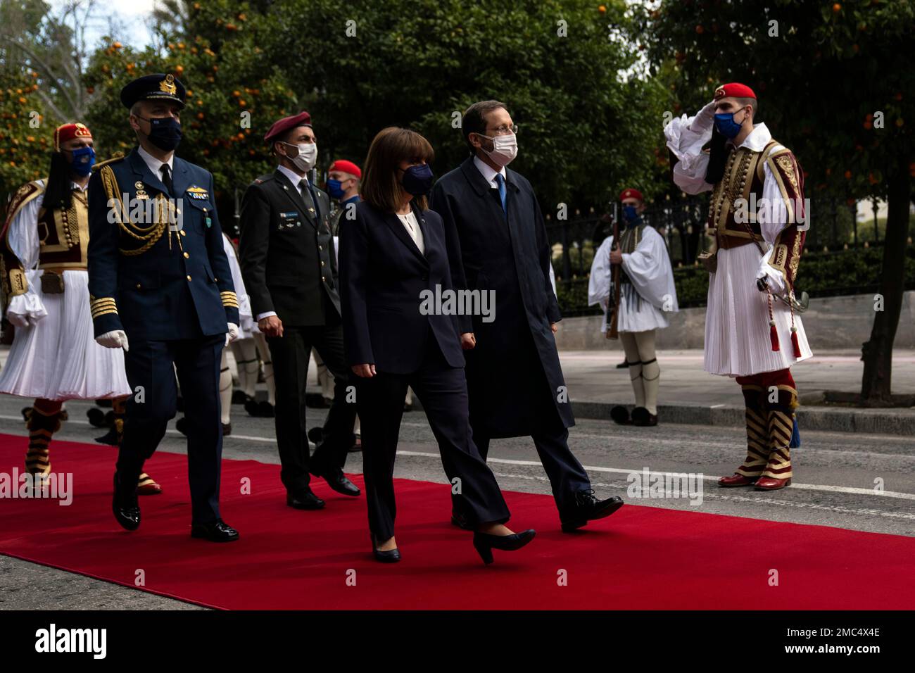 Greek President Katerina Sakellaropoulou, left, and her Israeli ...