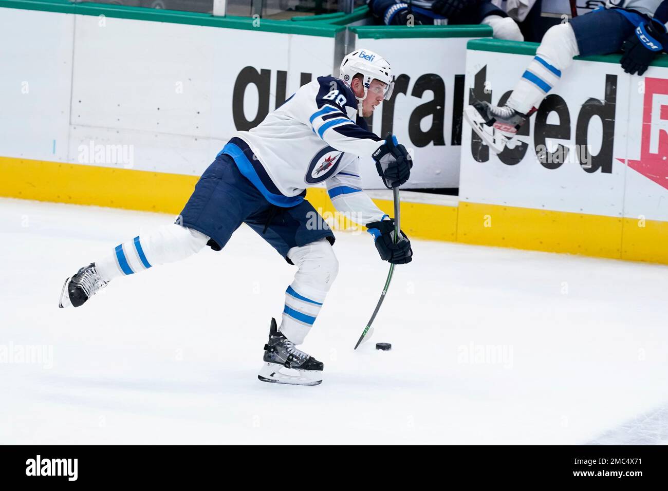 Winnipeg Jets defenseman Nate Schmidt makes a pass during an NHL hockey ...