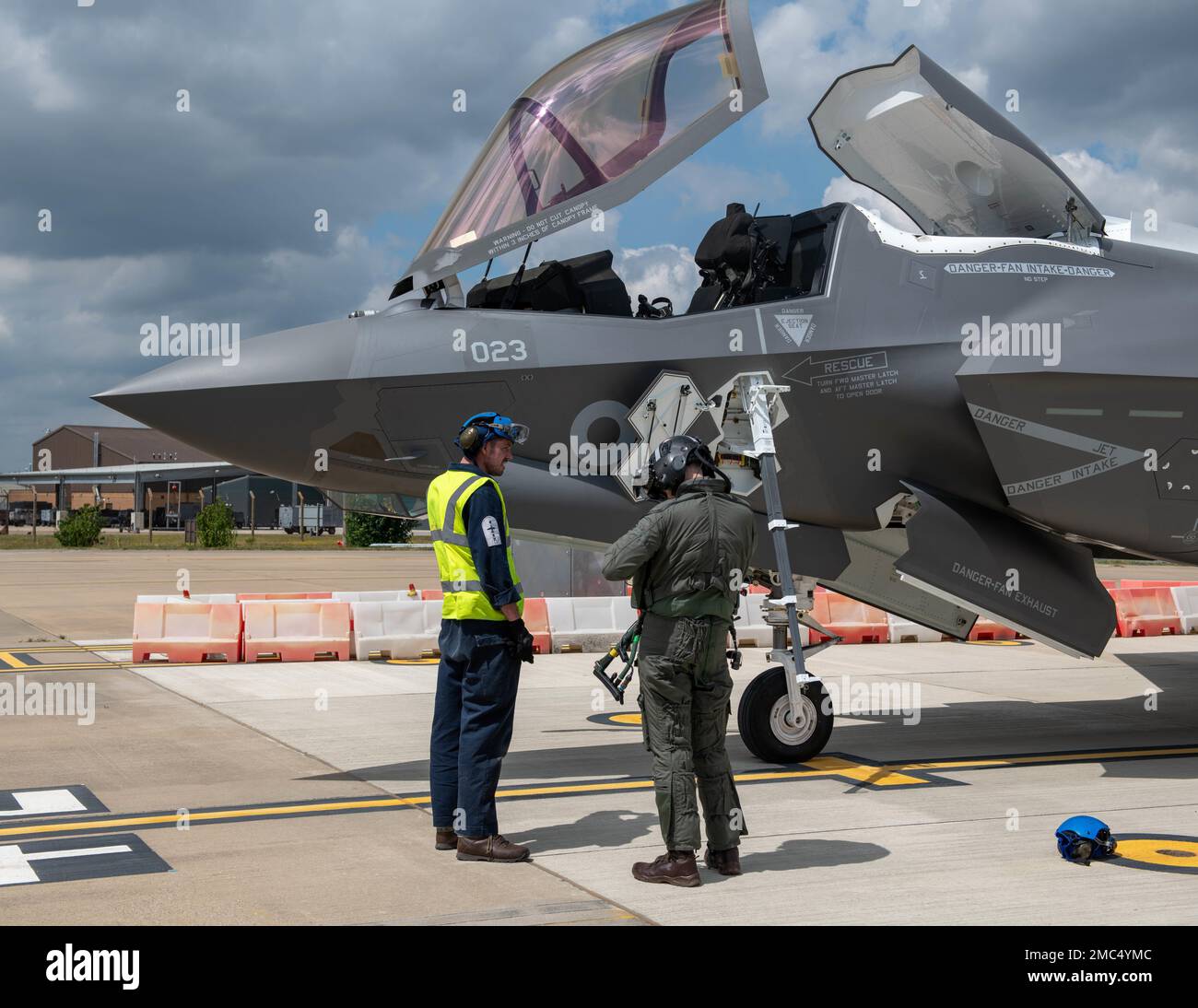 A Royal Air Force pilot and crew chief assigned to RAF Marham prepare ...