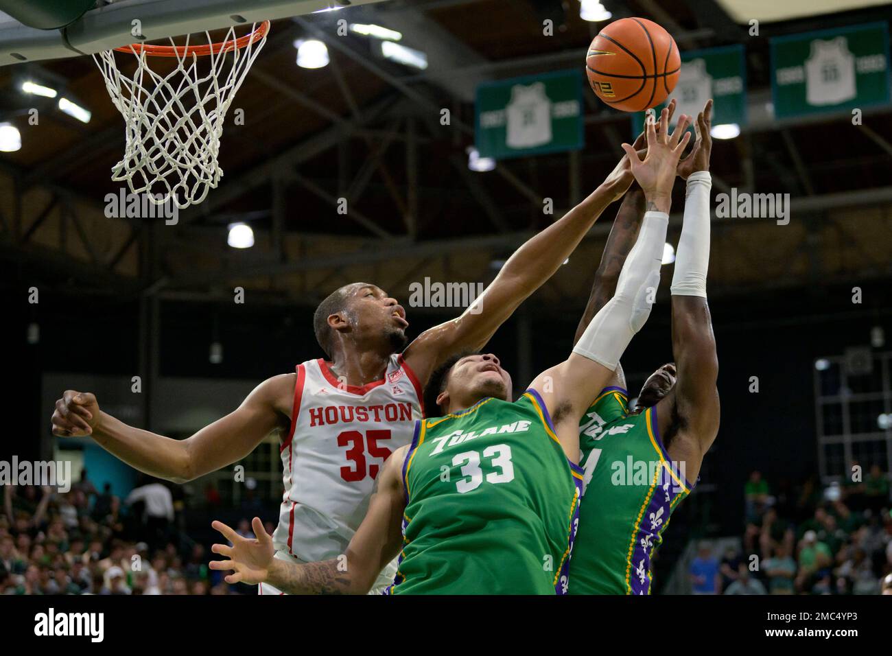 Houston forward Fabian White Jr. (35) jumps for a rebound against ...