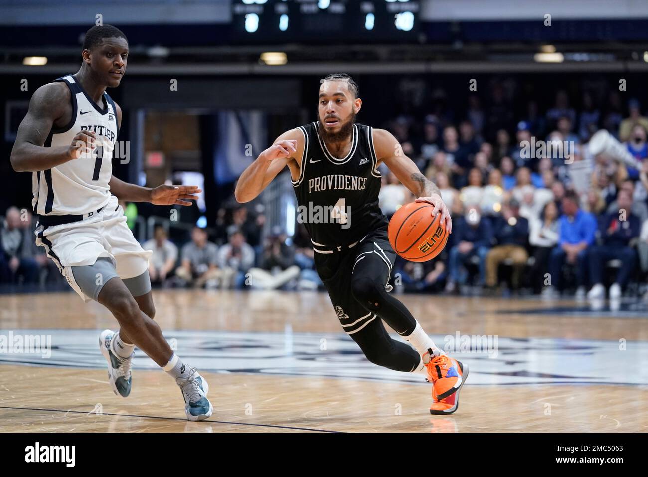Providence's Jared Bynum (4) is defended by Butler's Bo Hodges (1 ...
