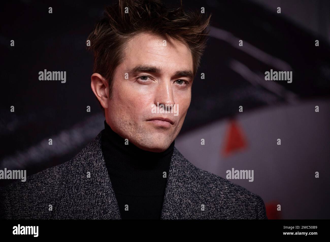 Robert Pattinson poses for photographers upon arrival for the screening ...