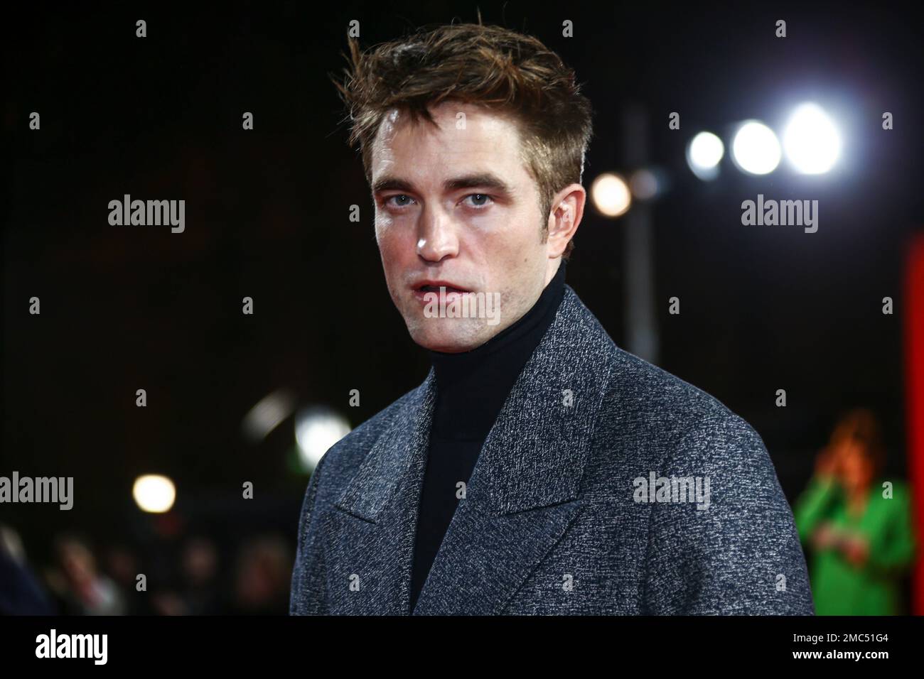 Robert Pattinson poses for photographers upon arrival for the screening ...