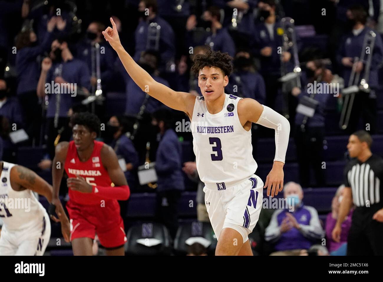 Northwestern's Ty Berry celebrates his three-point basket during the ...