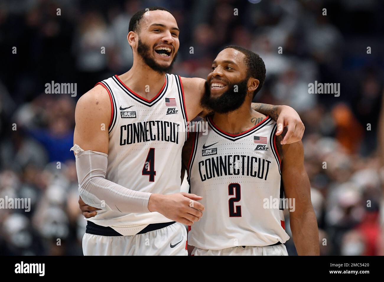 Connecticut's Tyrese Martin and R.J. Cole celebrate after the team's ...