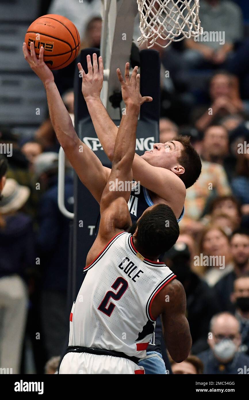 Villanova's Collin Gillespie (2) shoots as Connecticut's R.J. Cole (2 ...