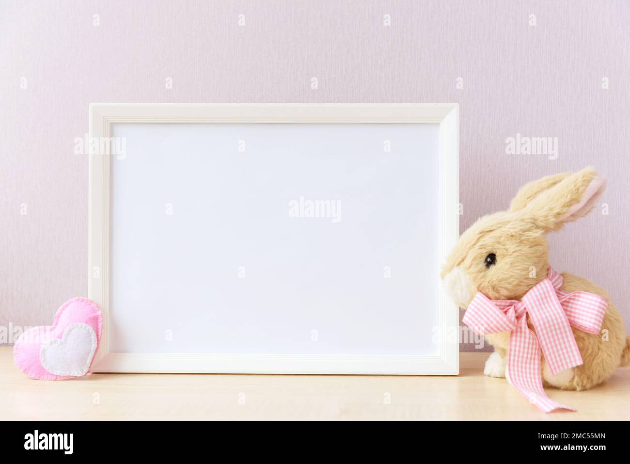 Easter mockup horizontal white frame with bunny Stock Photo - Alamy