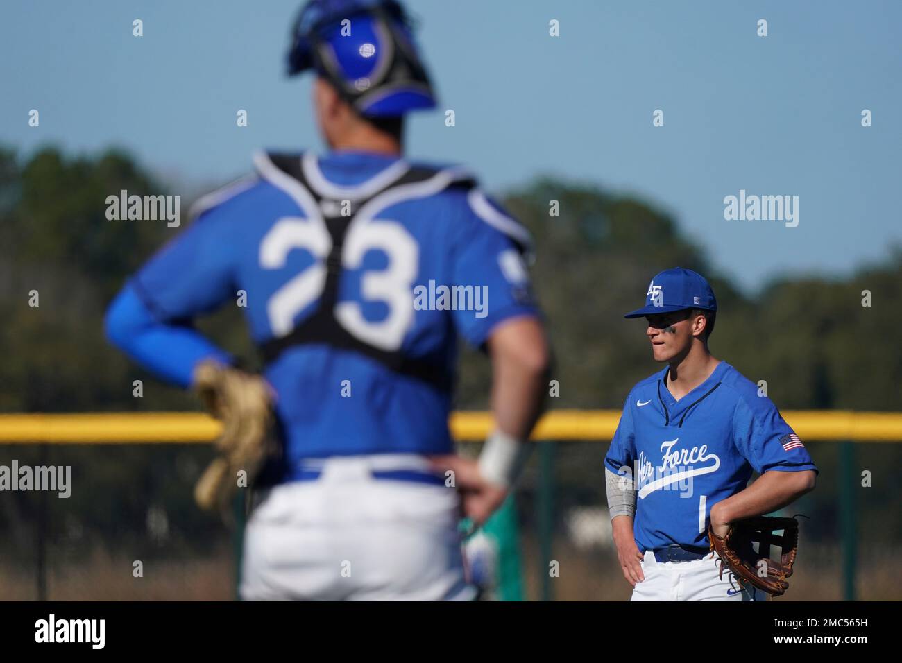 Air Force pitcher Kyle Moats (1) and Paul Skenes (23) wait for a batter ...