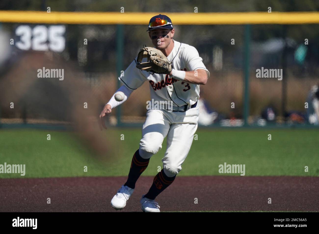Bucknell's Jacob Corson fields a batted ball during an NCAA baseball ...
