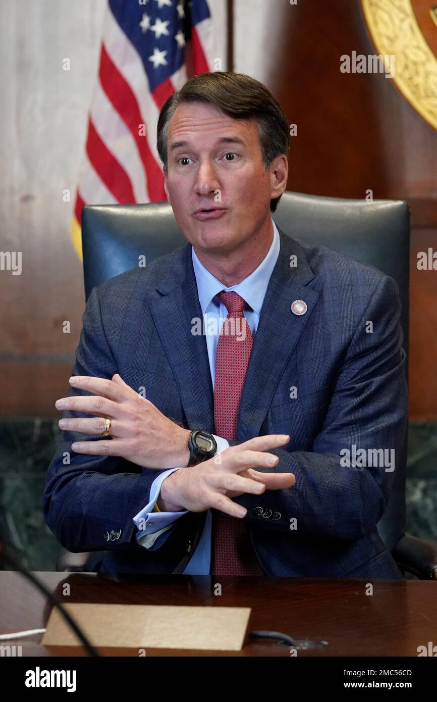 Virginia Gov. Glenn Youngkin, gestures during an interview in his ...