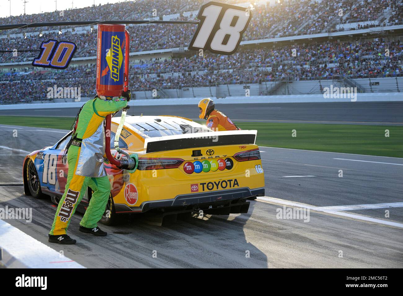 Kyle Busch (18) makes a pit stop during the NASCAR Daytona 500 auto ...