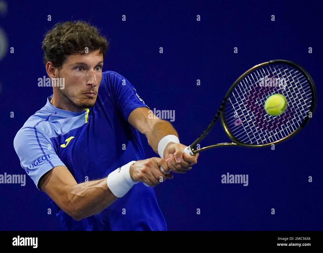 Pablo Carreno Busta, of Spain, returns a ball to Oscar Otte, of Germany ...