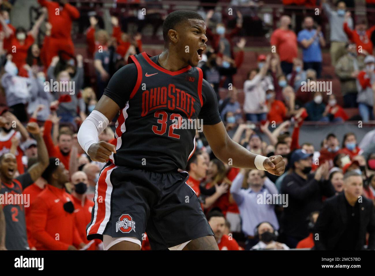 Ohio State's E.J. Liddell celebrates after dunking during the second ...