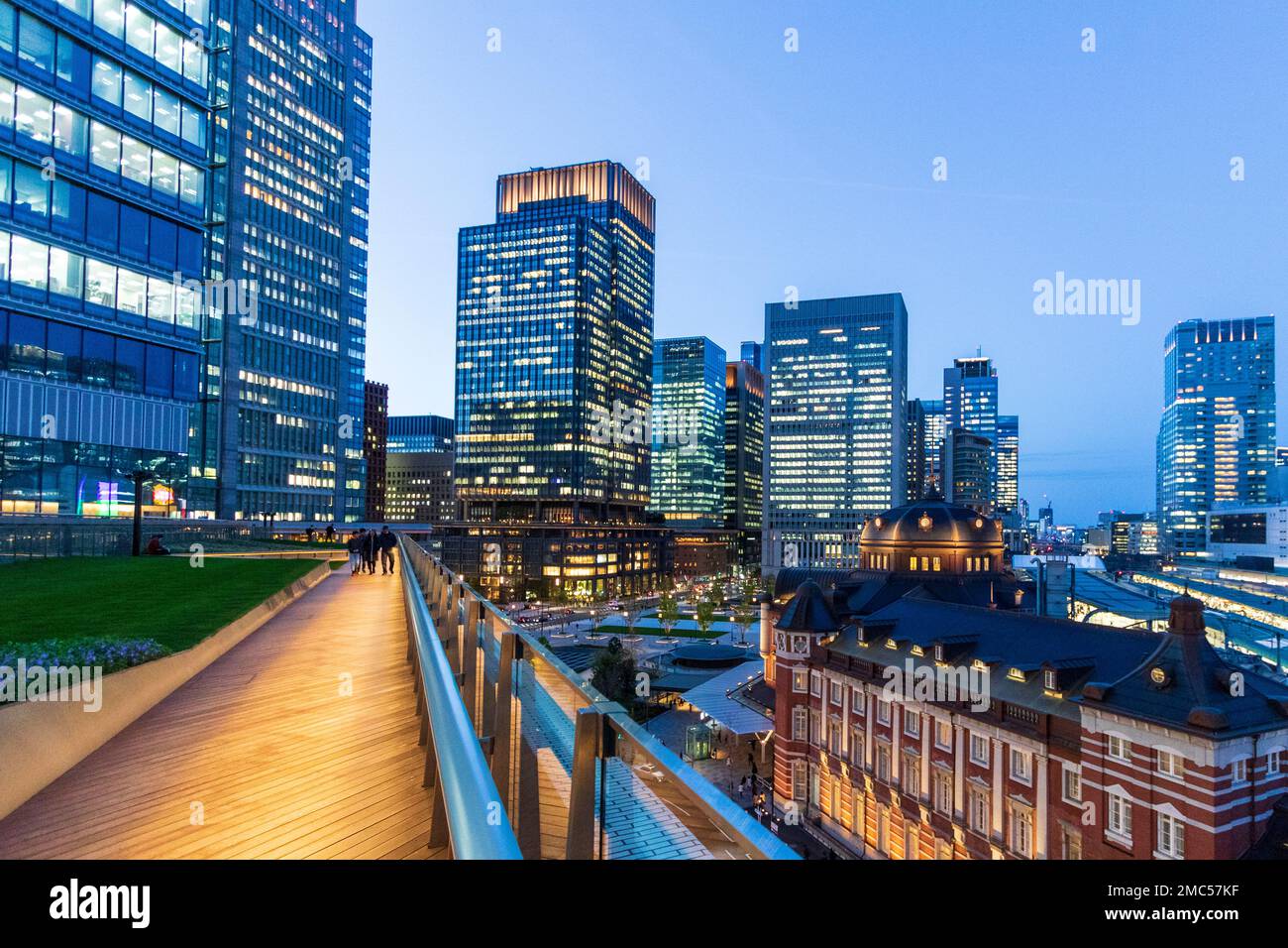 Tokyo station and high rise office blocks seen from the rooftop garden ...
