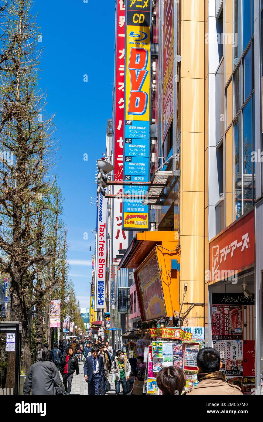 View along Chuo-dori at Tokyo's Akihabara electronic center. Busy with ...