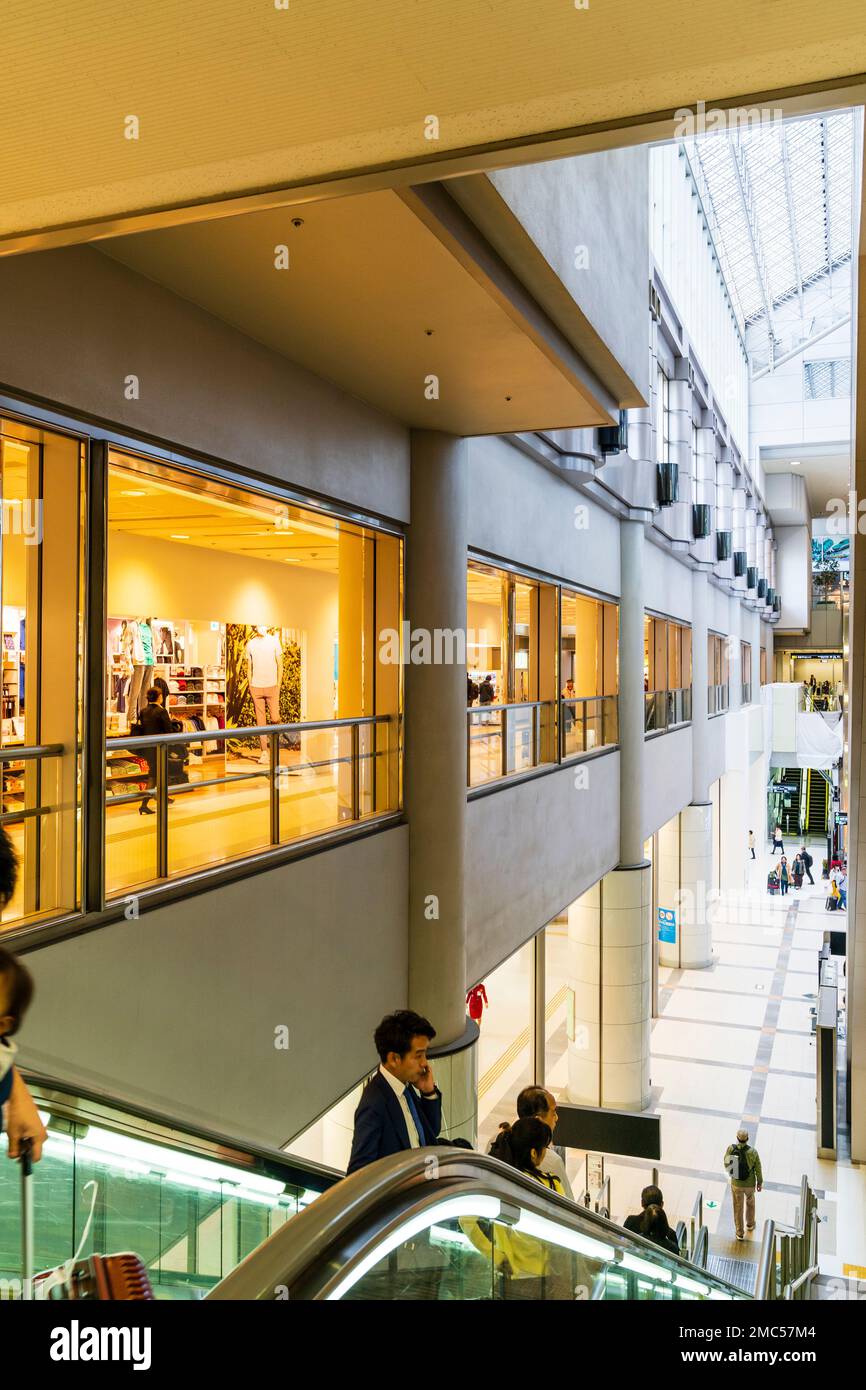 Tokyo Haneda airport terminal one interior. First floor view of people ...