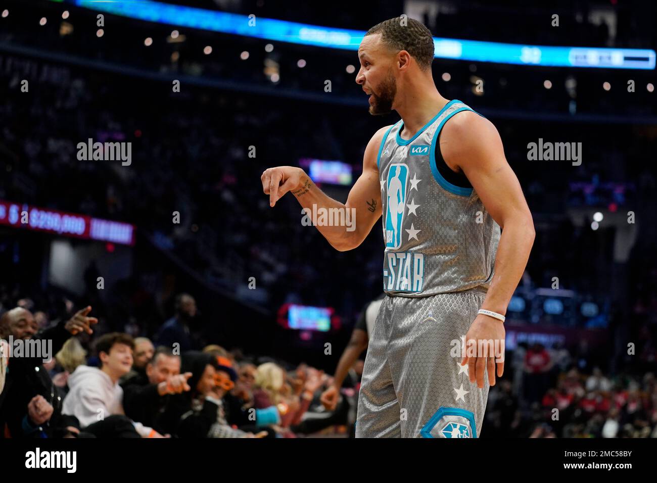 Golden State Warriors' Stephen Curry jokes with fans during the NBA All ...