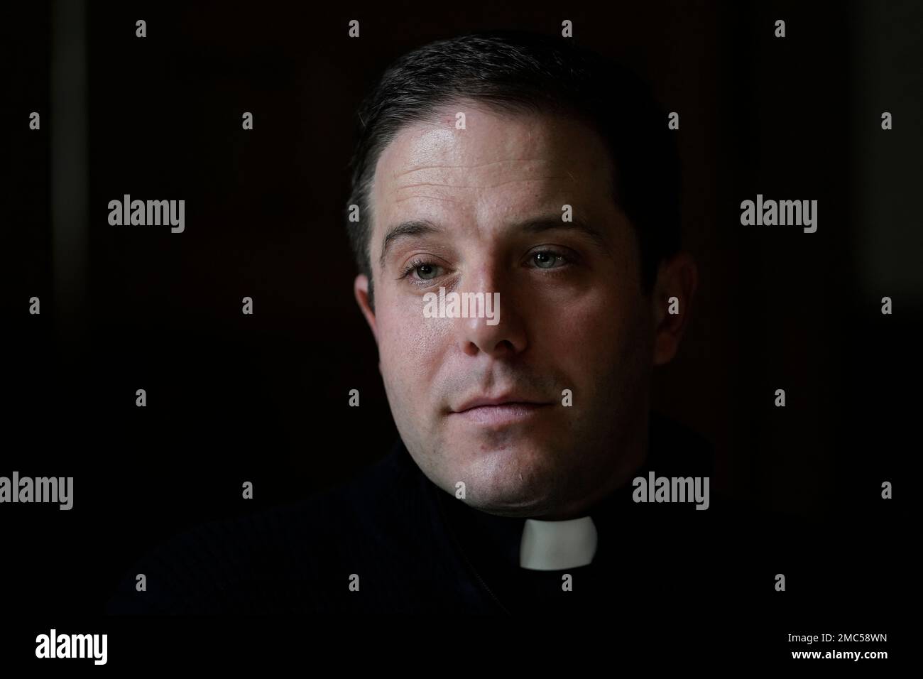 Father Matthew Hood is shown at Our Lady of the Rosary church Friday ...