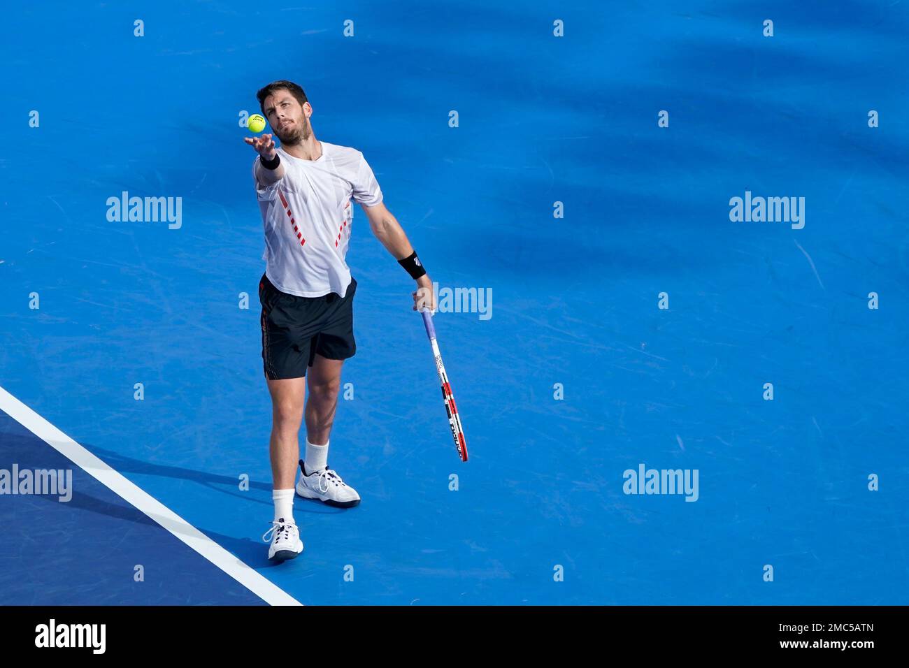 Cameron Norrie of Britain serves to Reilly Opelka during the final at ...
