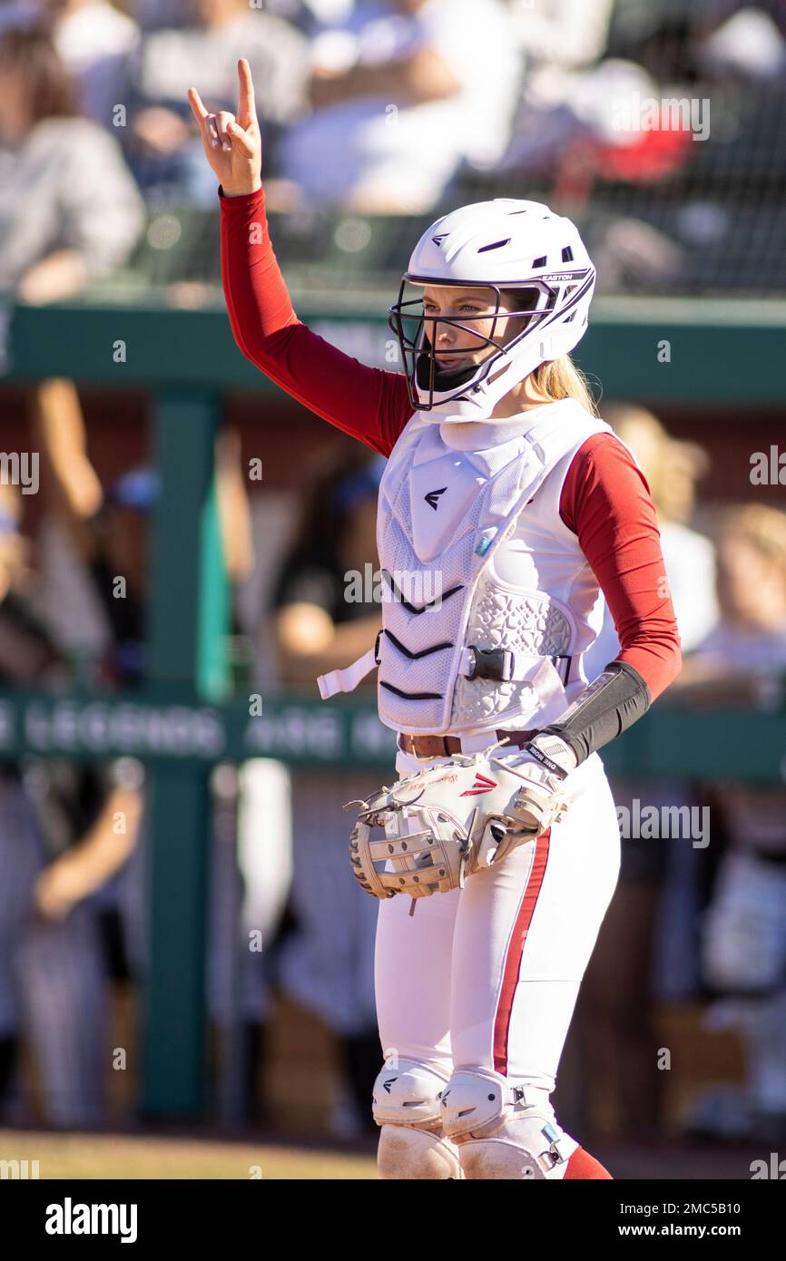 Alabama catcher Ally Shipman (34) signals for two outs to her teammates ...