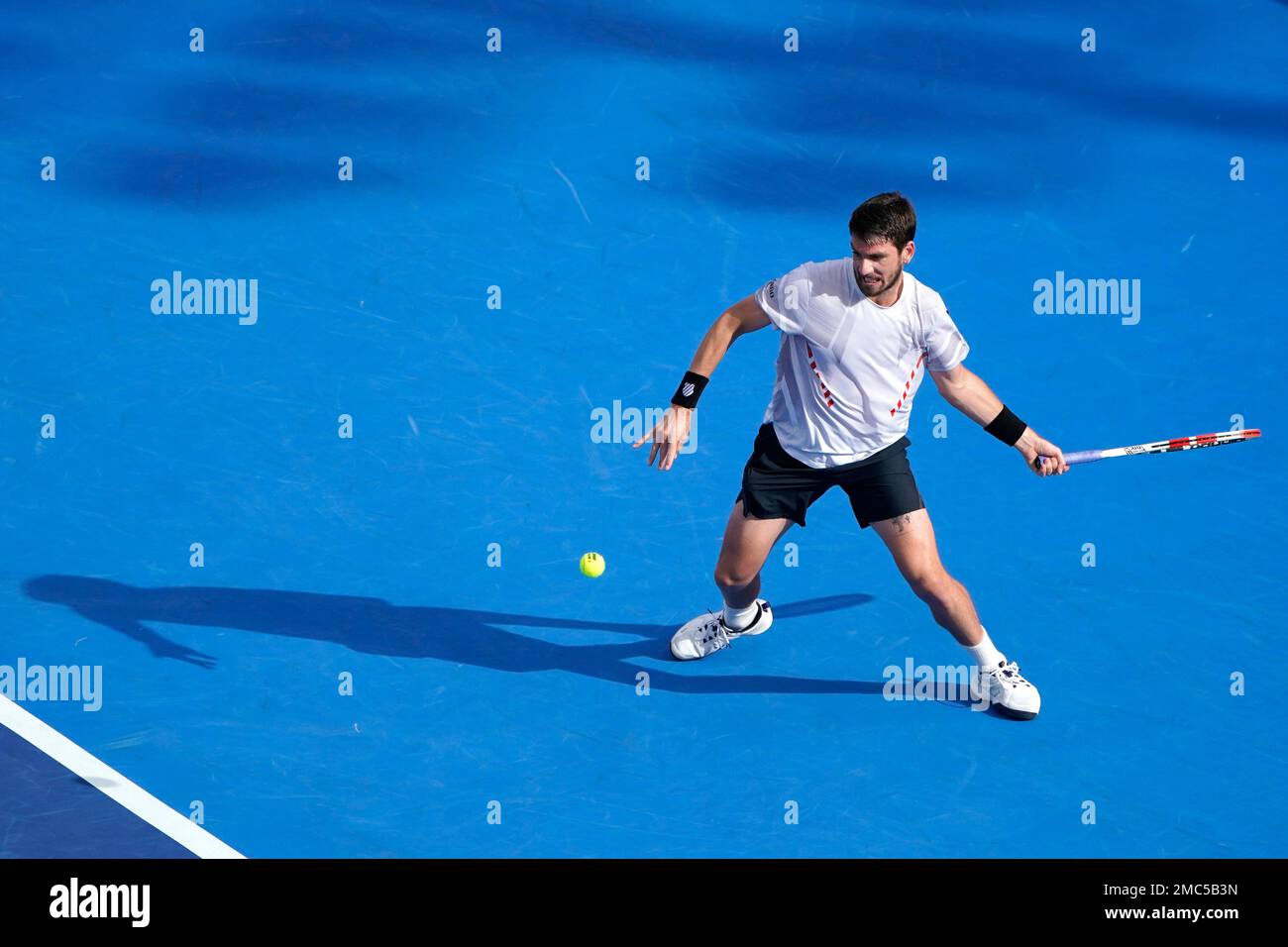 Cameron Norrie of Britain prepares to hit a return to Reilly Opelka ...