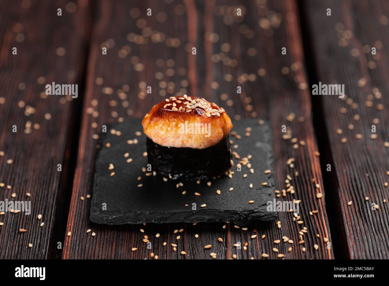 Baked shrimp gunkan on wooden background. Simple gunkan sushi with ...