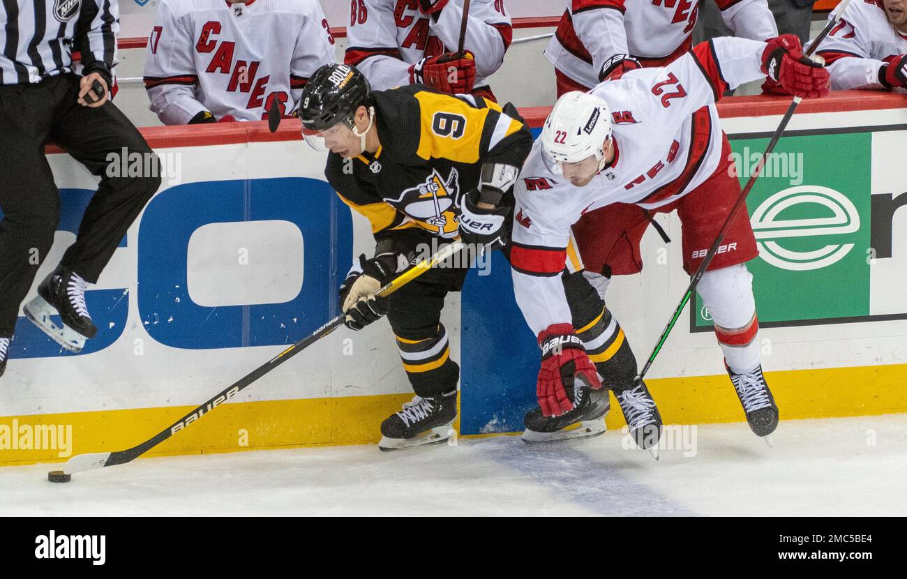 Pittsburgh Penguins winger Evan Rodrigues (9) and Carolina Hurricanes ...