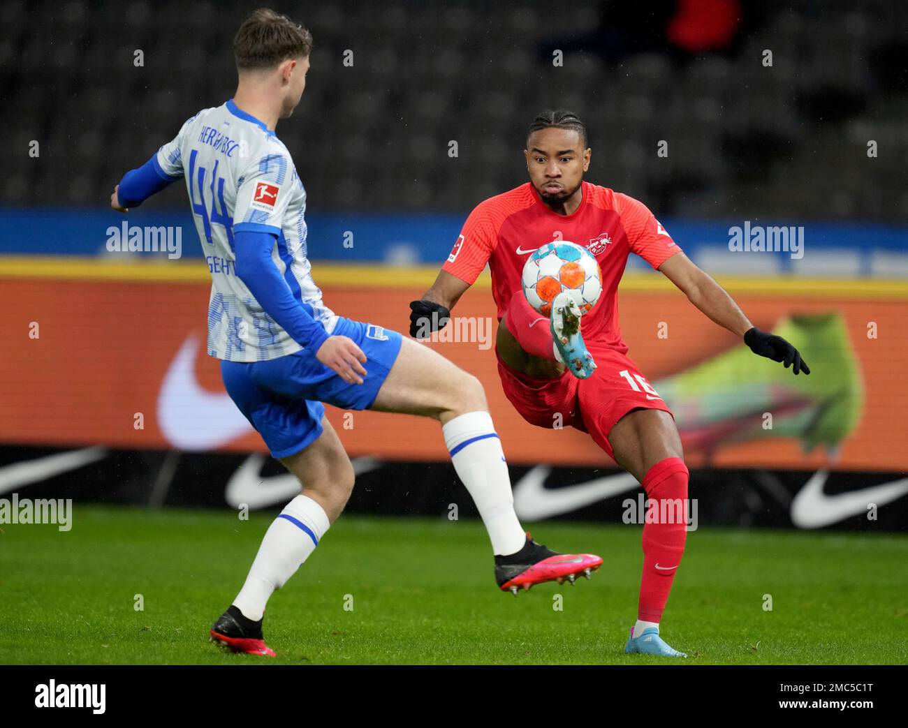 Berlin's Linus Gechter, left, and Leipzig's Christopher Nkunku, right ...