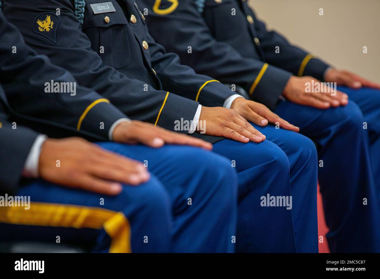 Soldiers sit at the position of attention while answering questions ...