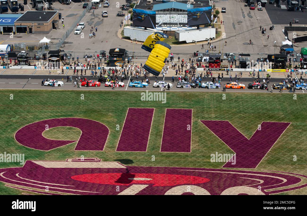 A member of the U.S. Navy Parachute Demonstration Team, "The Leap Frogs ...