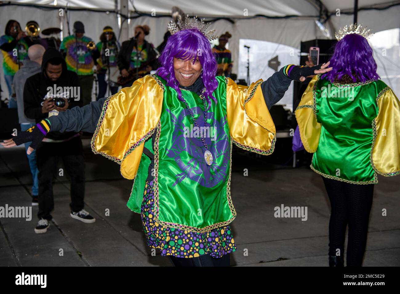 Krewe of Freret members dance at a pre-parade party at Mardi Gras World ...