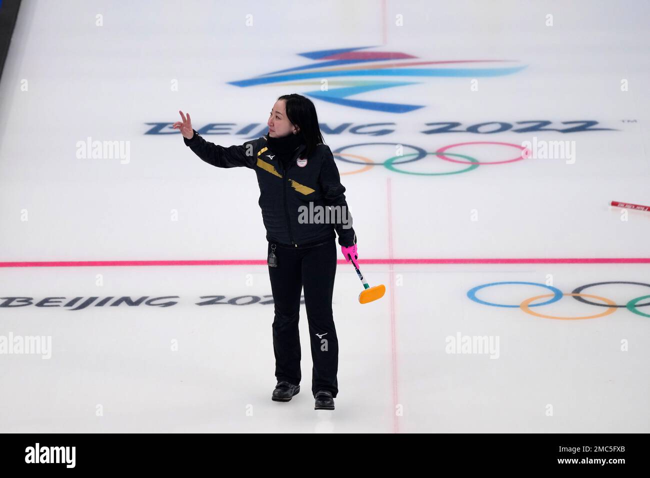 Japan's Satsuki Fujisawa waves to the crowd before leaving the ice at ...