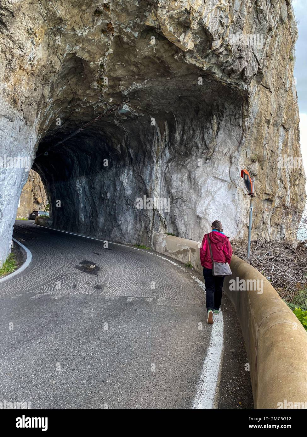 Female tourist walking on the road at the amalfi coast hi-res stock ...