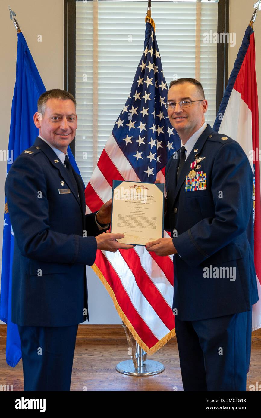Lt. Col. Wesley Colebar, right, strategy analyst for the 157th Combat ...