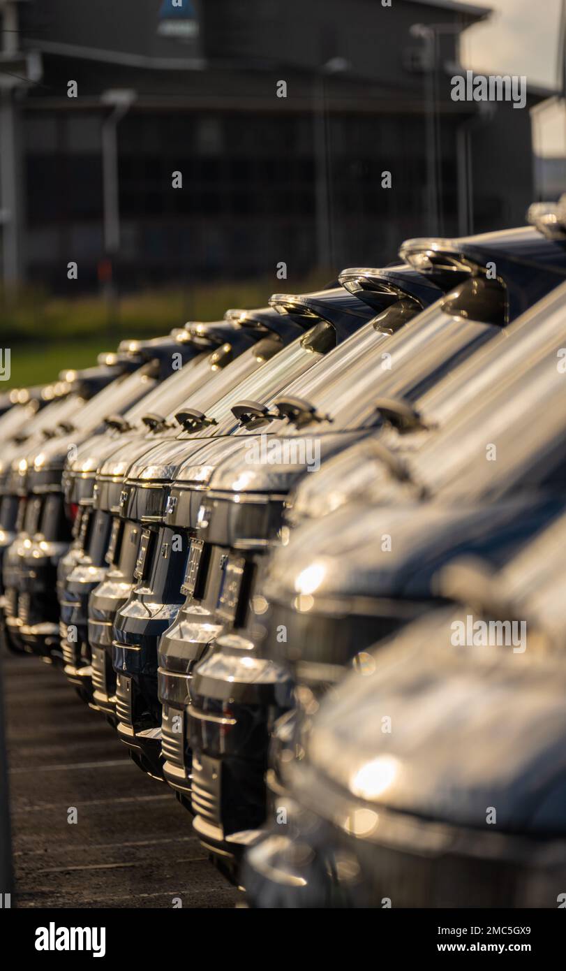 Long row of black cars ready for delivery at a car dealership Stock ...