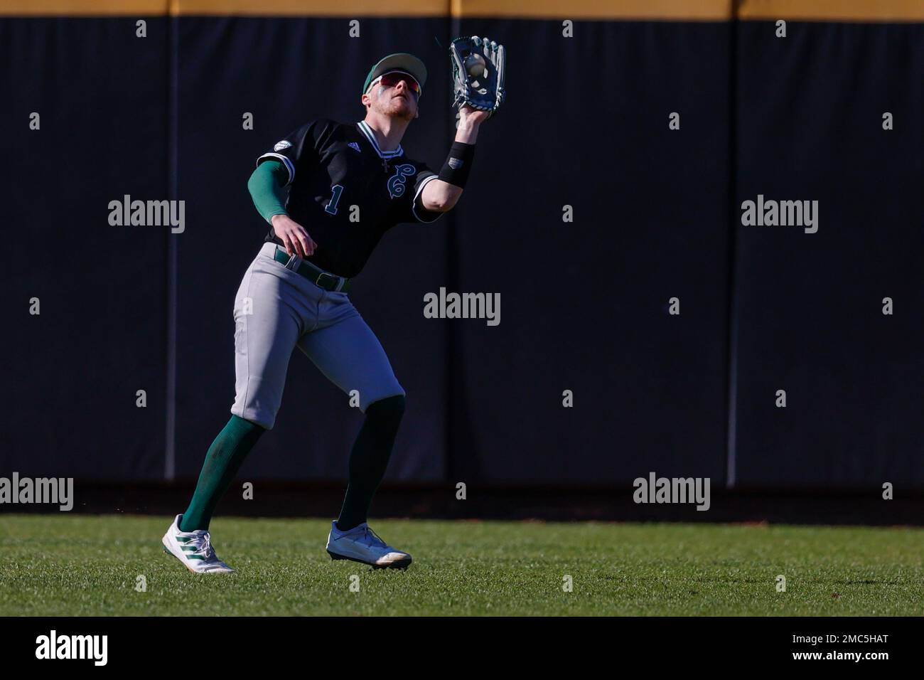 Eastern Michigan outfielder Shane Easter catches a fly ball for an out ...