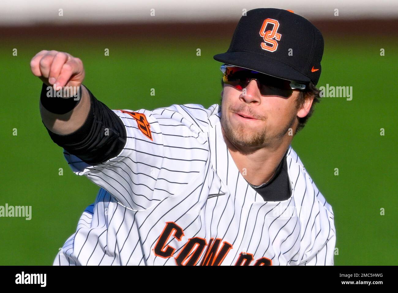 Oklahoma St. outfielder John Bay (36) works out before an NCAA college ...
