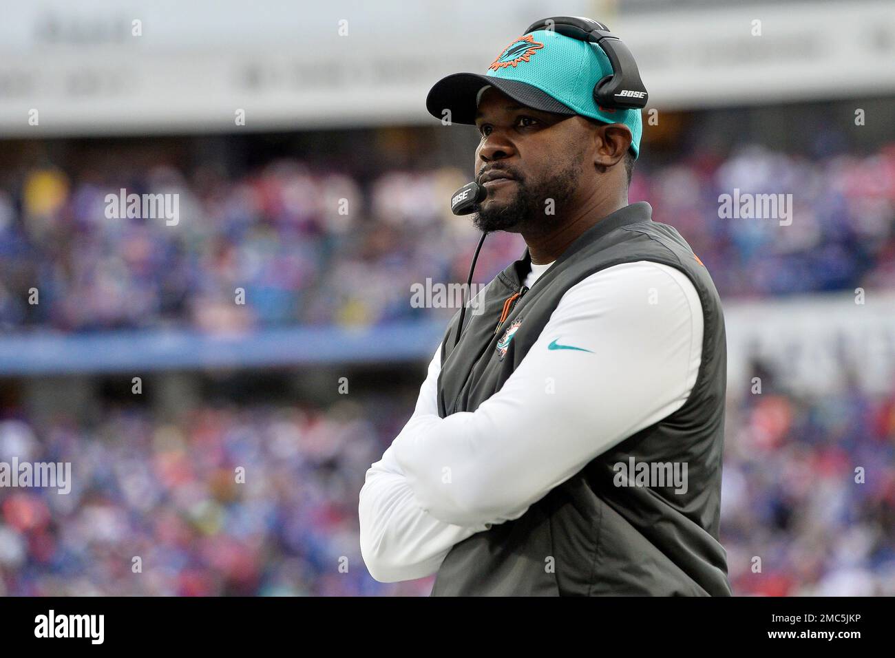 FILE- Miami Dolphins head coach Brian Flores watches from the sideline ...