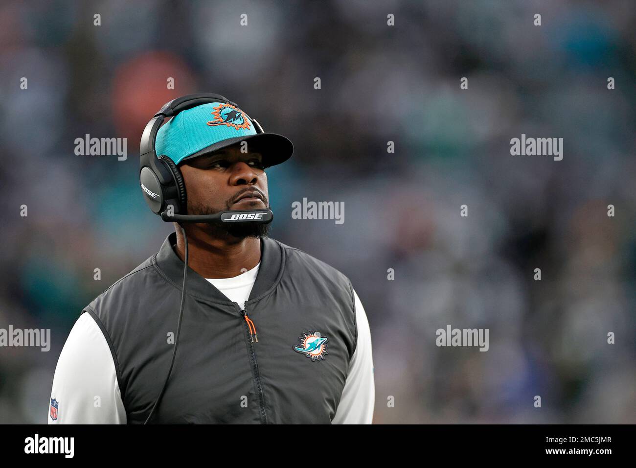 FILE - Miami Dolphins head coach Brian Flores looks on against the New ...