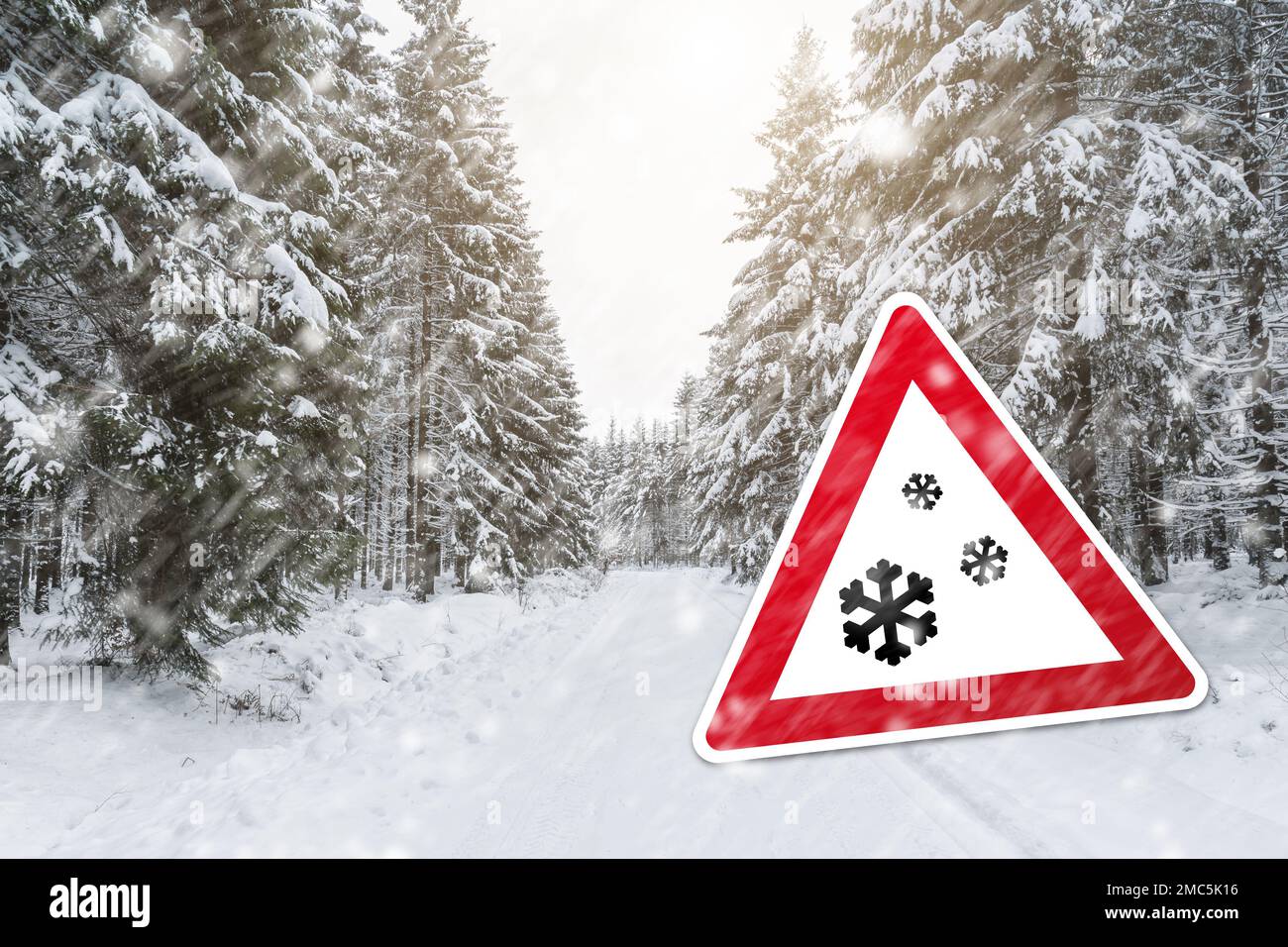 Snowfall sign at winter with forest Stock Photo - Alamy