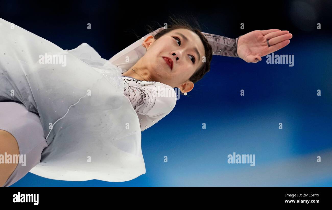 Peng Cheng and Jin Yang, of China, compete in the pairs free skate ...