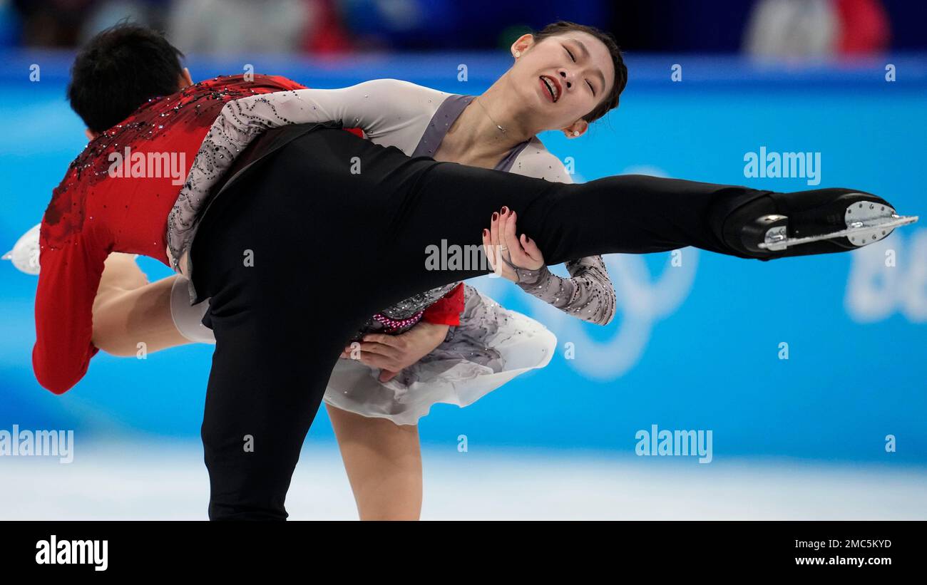 Peng Cheng and Jin Yang, of China, compete in the pairs free skate ...