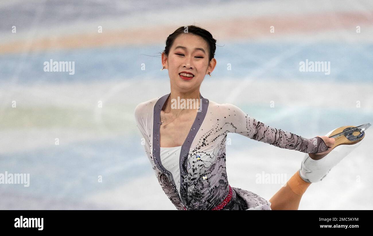 Peng Cheng and Jin Yang, of China, compete in the pairs free skate ...