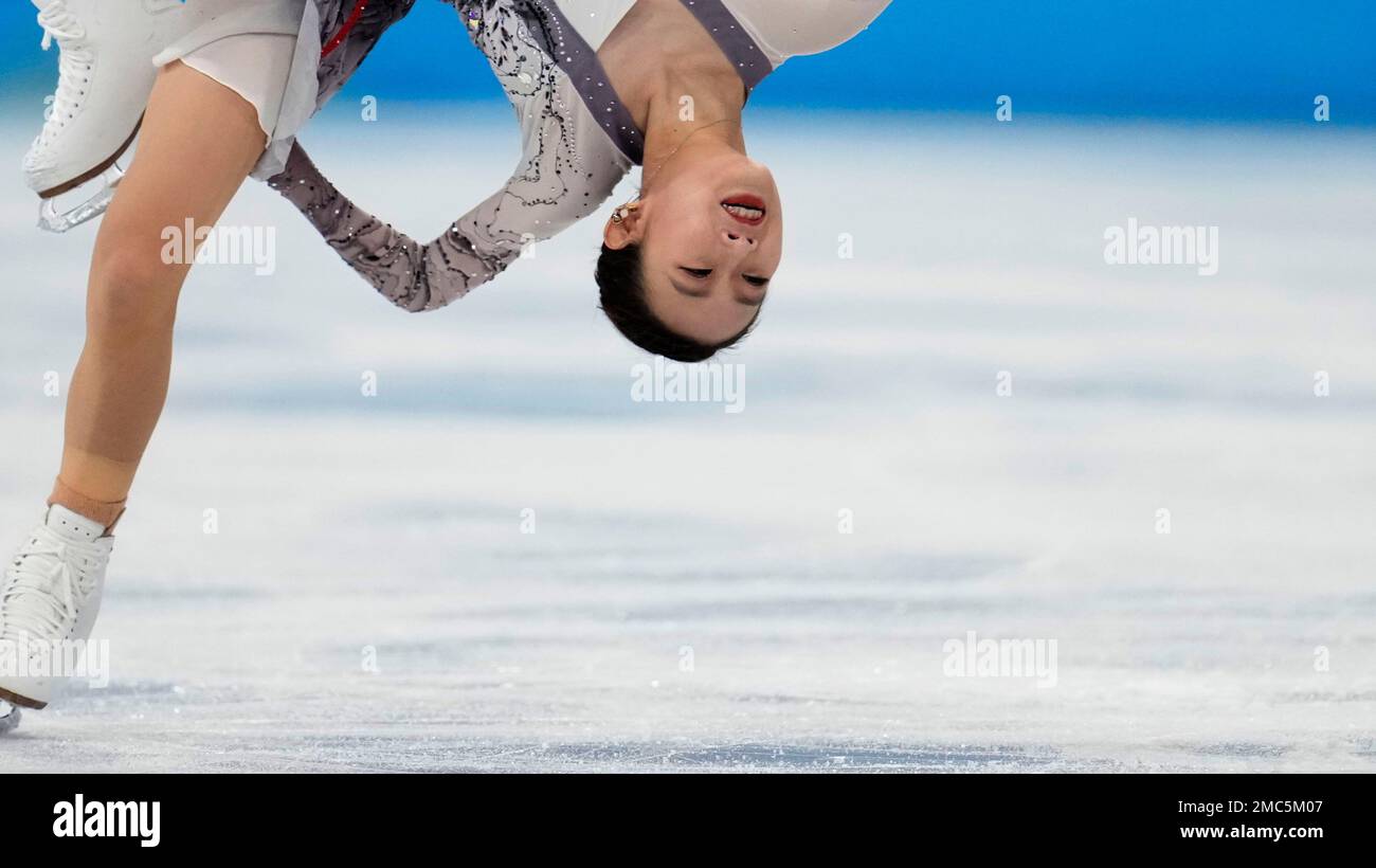 Peng Cheng and Jin Yang, of China, compete in the pairs free skate ...