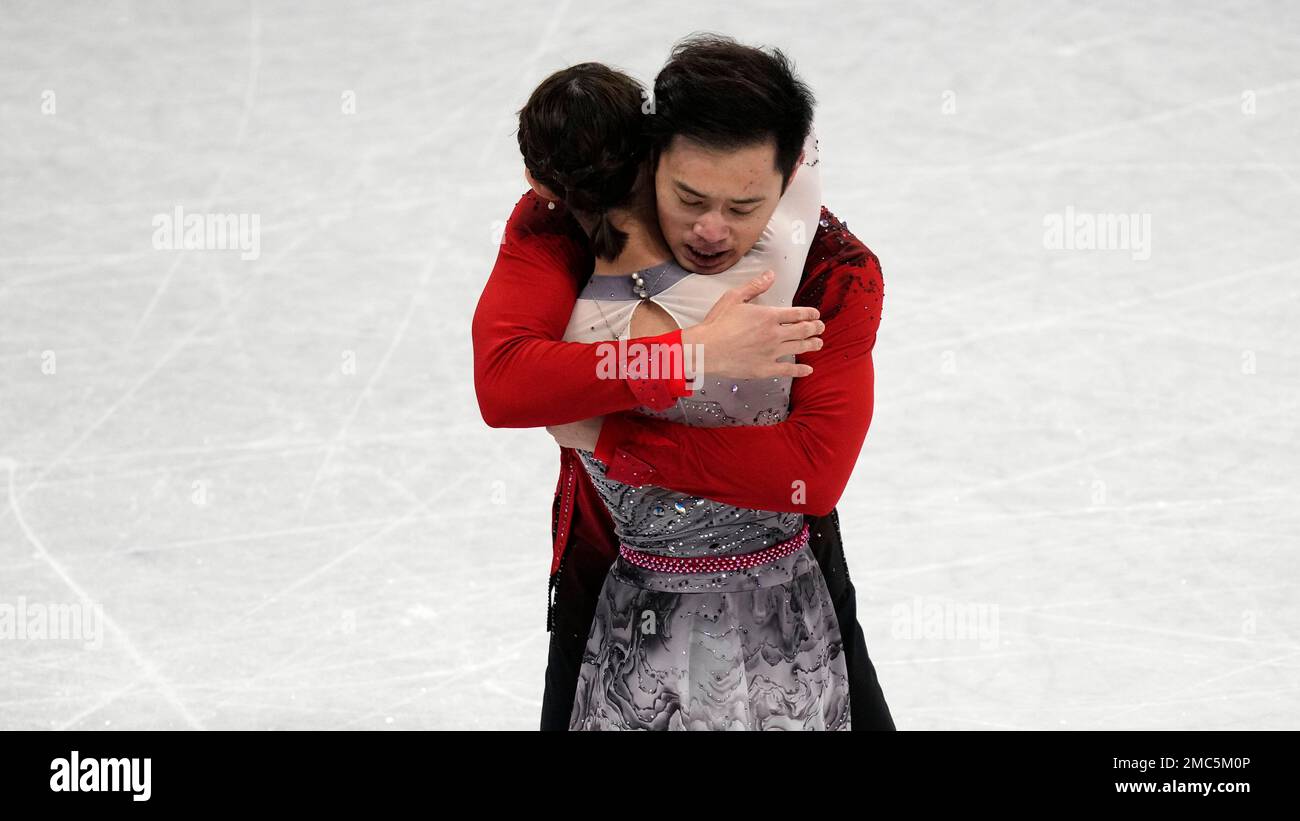 Peng Cheng and Jin Yang, of China, compete in the pairs free skate ...