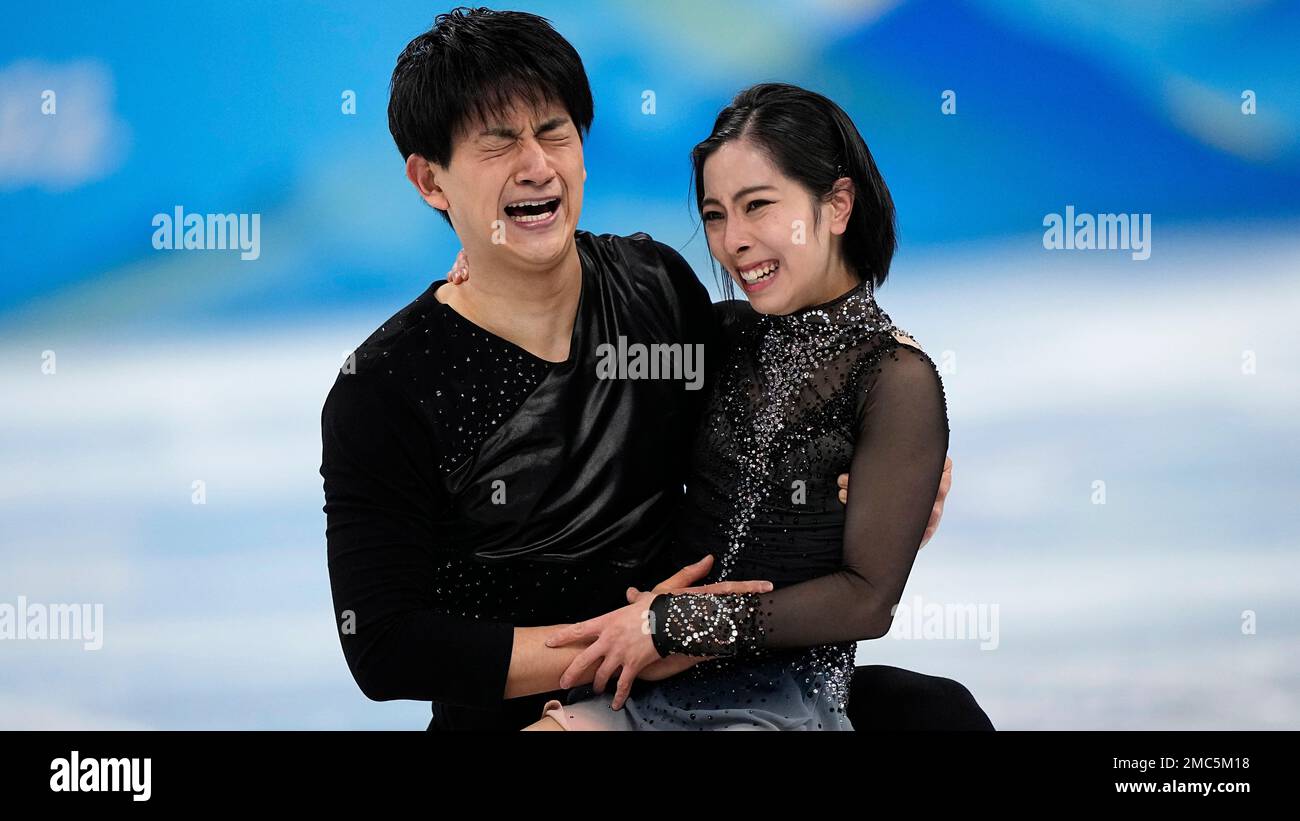 Riku Miura and Ryuichi Kihara, of Japan, compete in the pairs free ...